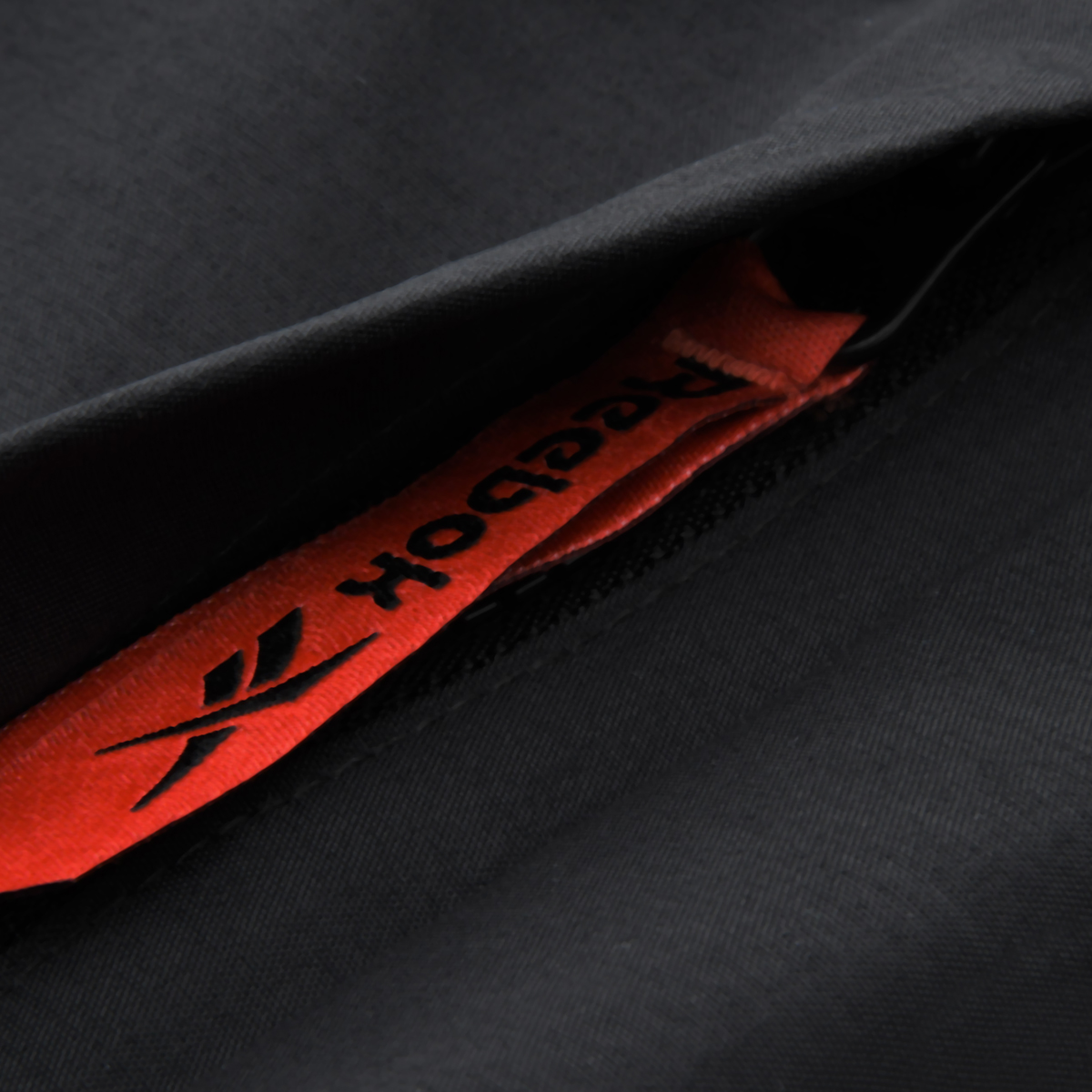 Campera urbana Reebok Outerwear Shell Performance Unisex | Moov